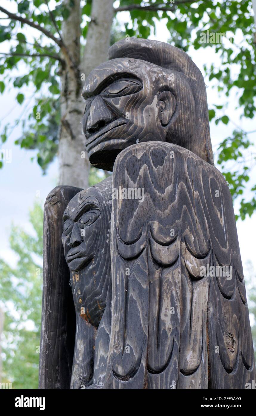 Weathered grey totem, Quw'utsun' Cultural & Conference Centre, Duncan ...