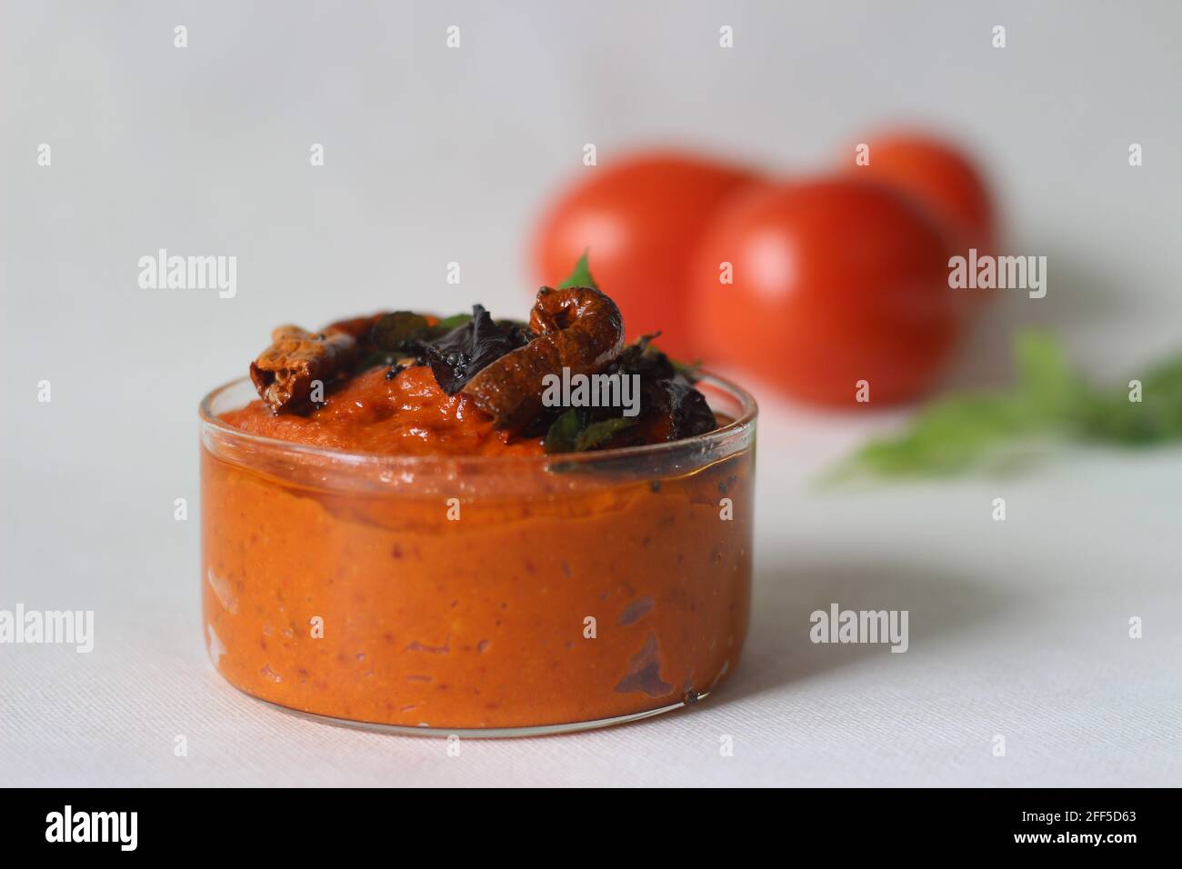 Homemade fresh spicy and hot condiment made with tomato and red ...