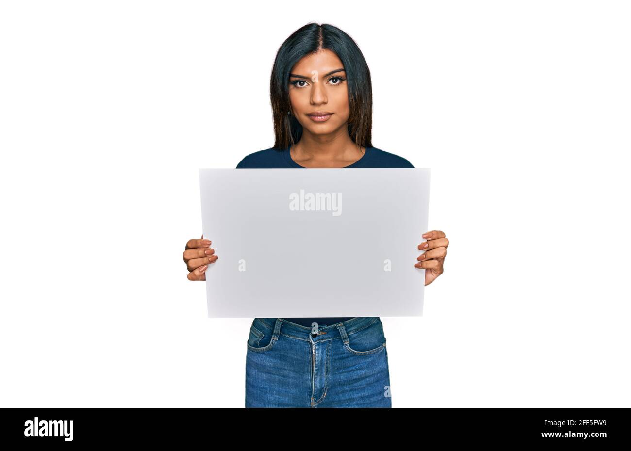 Young latin transsexual transgender woman holding blank empty banner ...