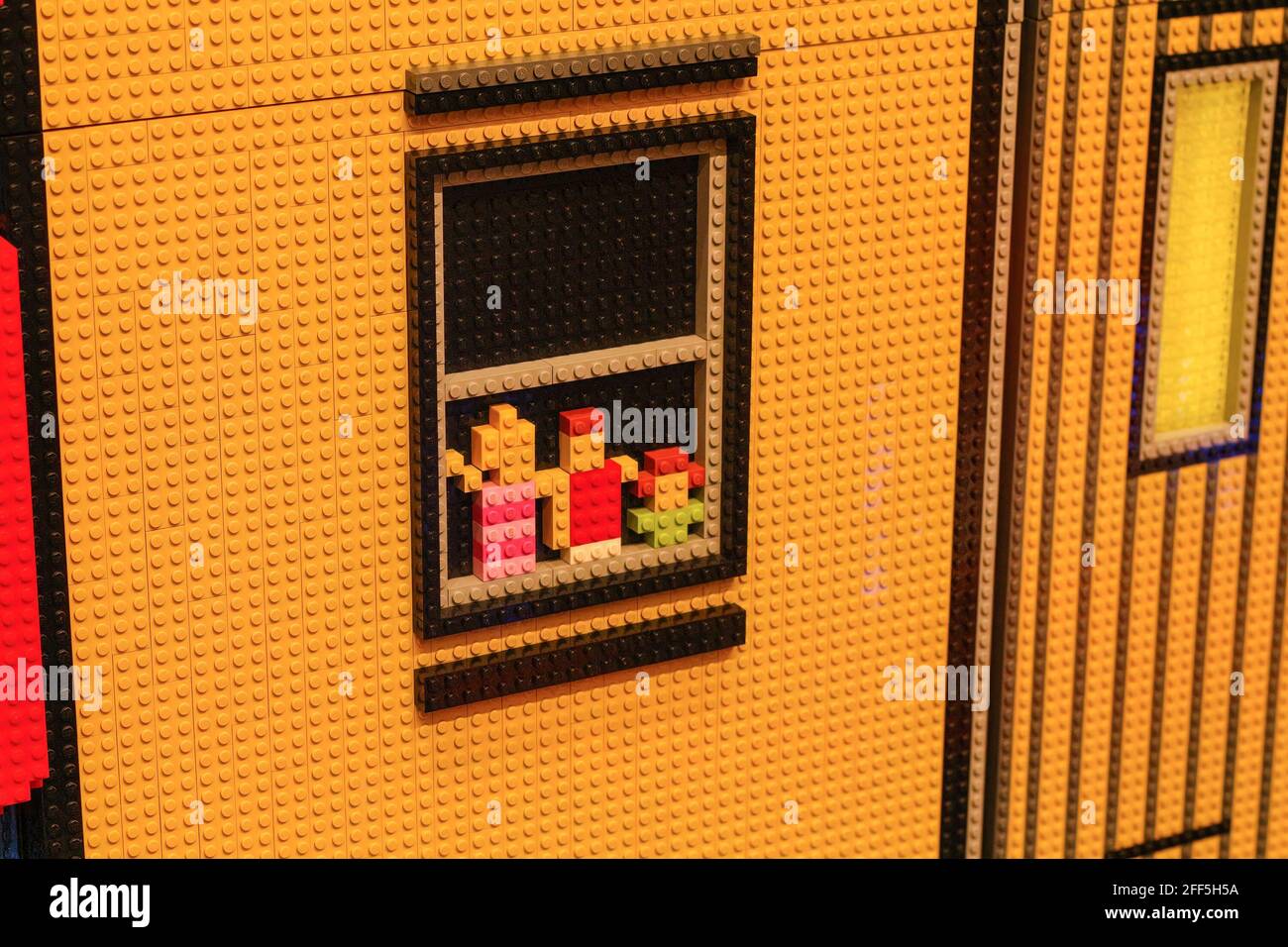 Shanghai, China. 17th Apr, 2021. Replica of a family in a window on a ...