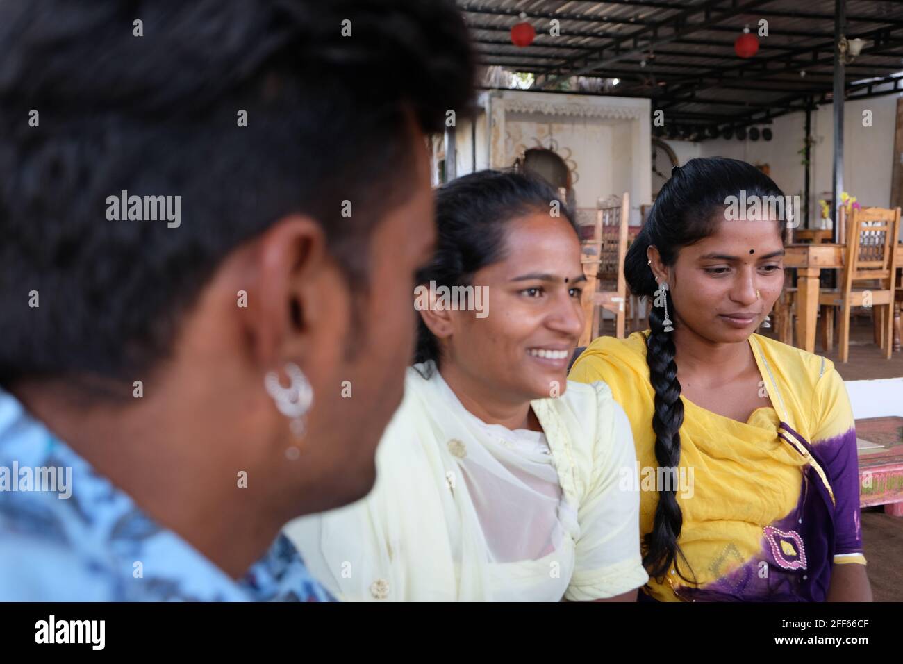 Group of young Indian friends enjoying their time in a cafe Stock Photo ...