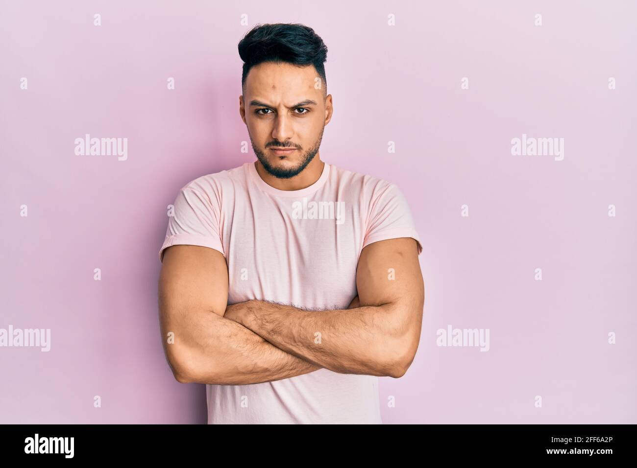 Young arab man wearing casual clothes skeptic and nervous, disapproving ...