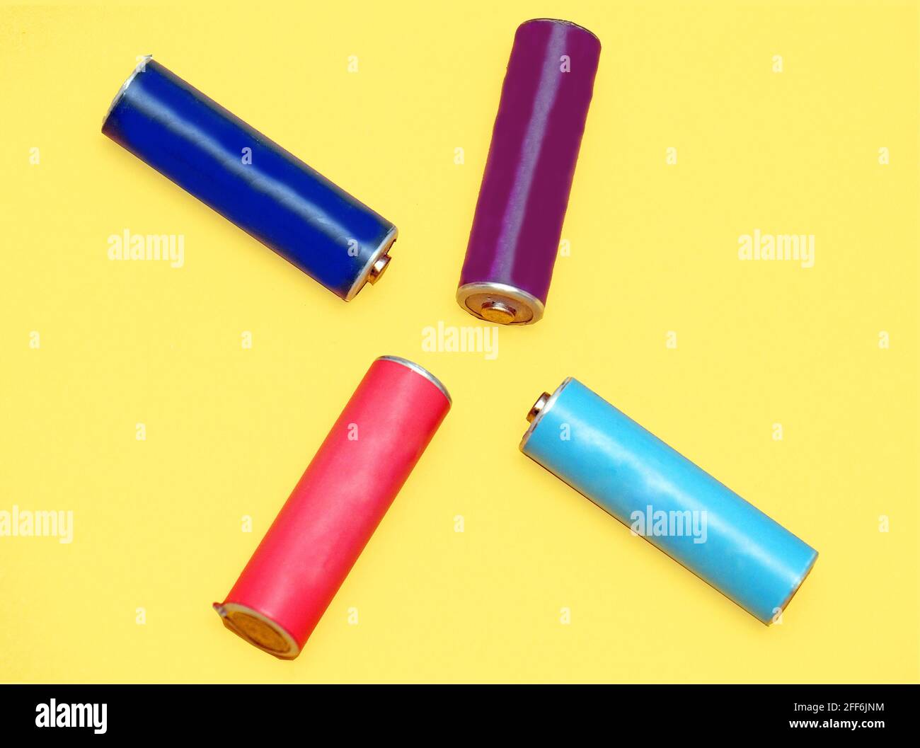 Colorful lithium batteries in a circle on yellow background Stock Photo ...