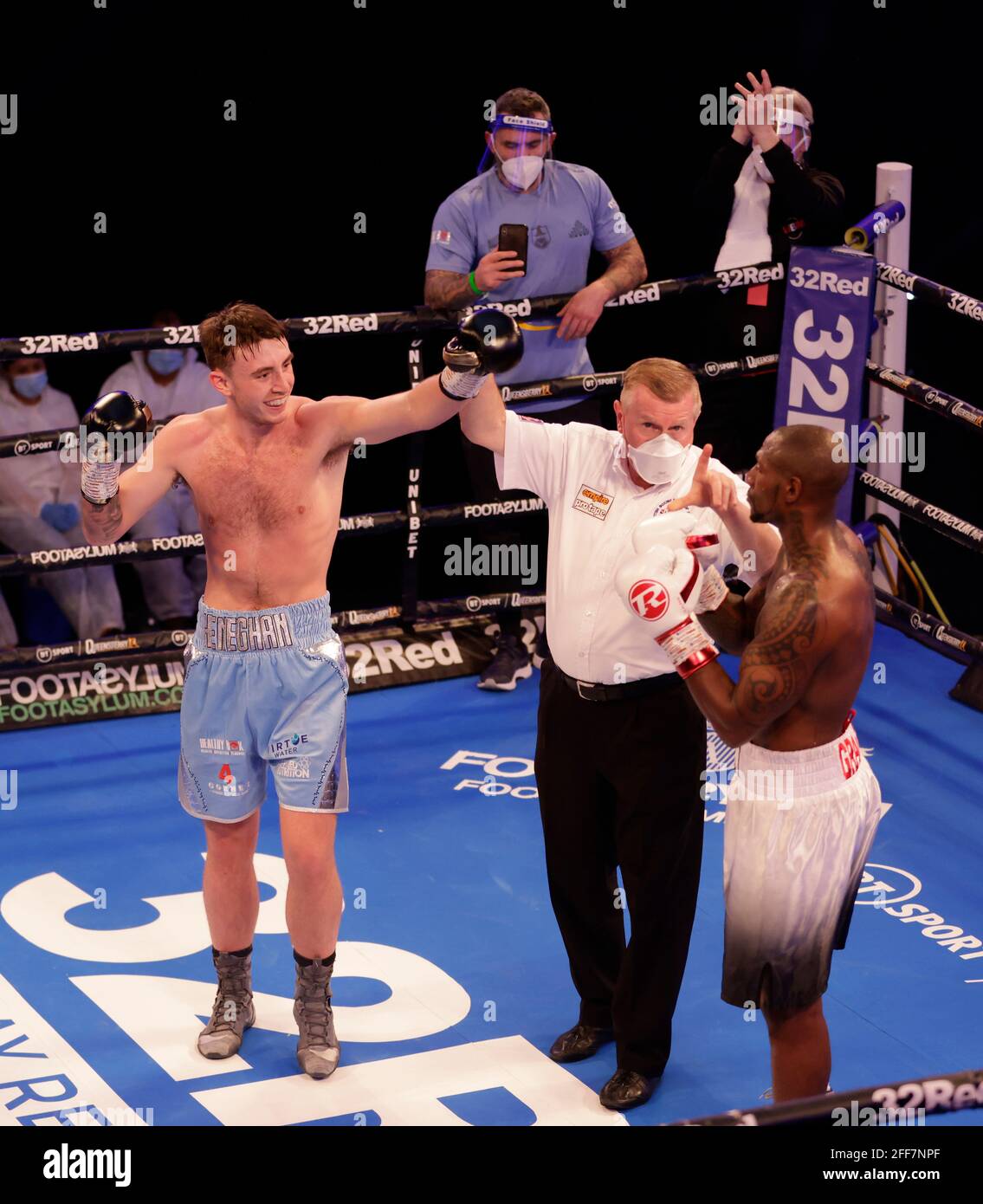 James Heneghan (left) celebrates victory against Dwain Grant after ...