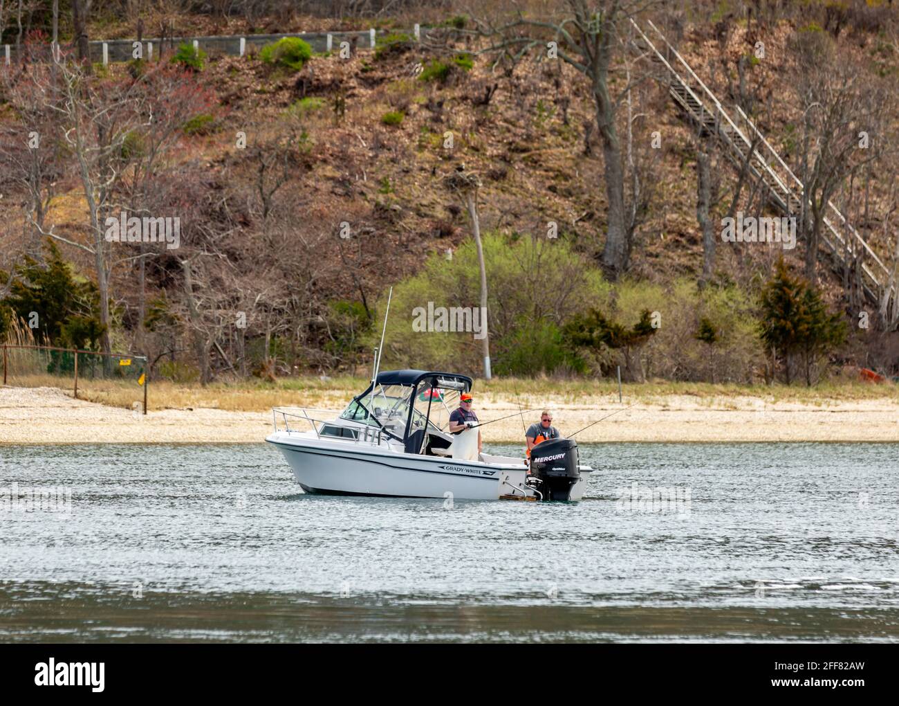 Two men fishing from a boat hi-res stock photography and images - Alamy