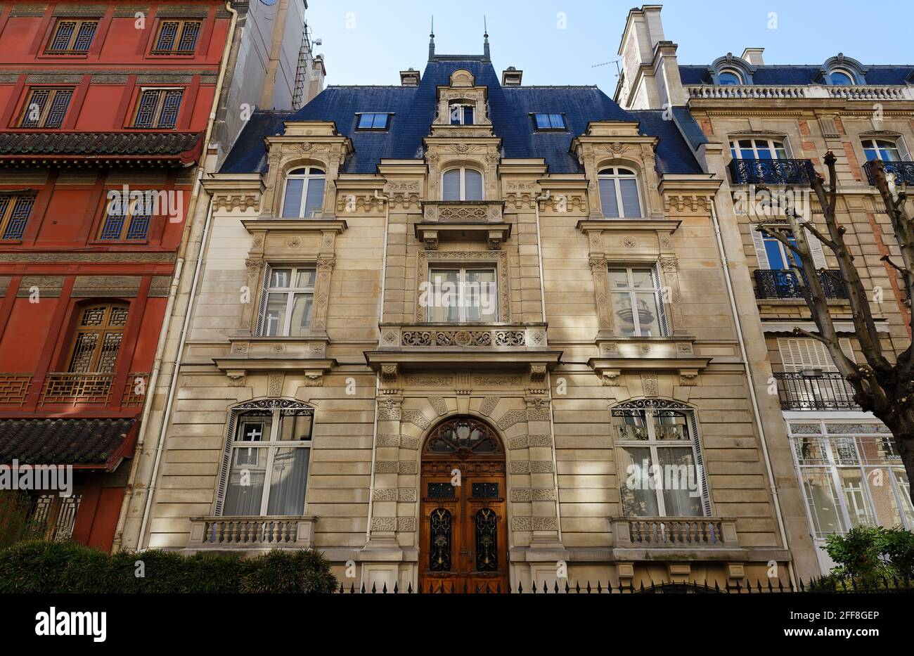 Traditional French house with typical balconies and windows. Paris ...