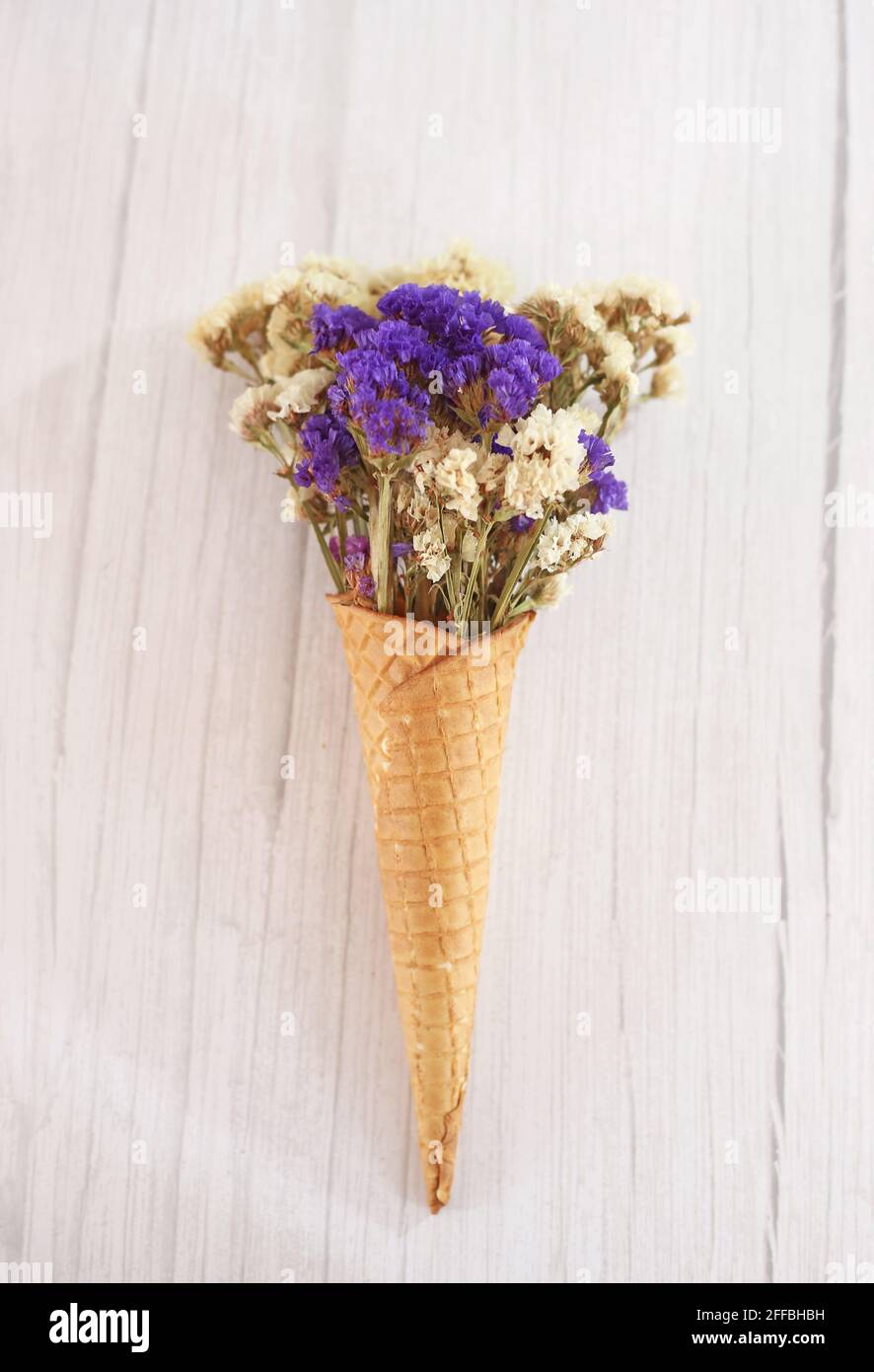 decorative ice cream cone with dried flowers Stock Photo - Alamy