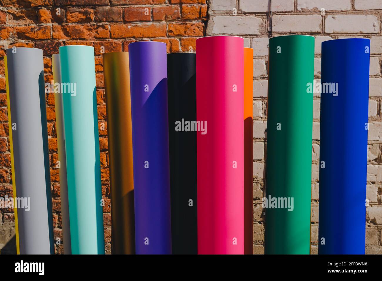 Row of various colored vinyl car wrapping or plotter cutting sticker ...