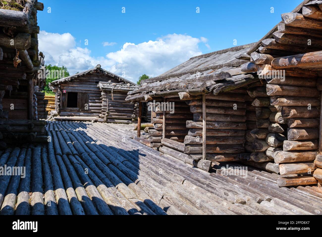 details of old restored wooden log castle. settlement of ancient people ...