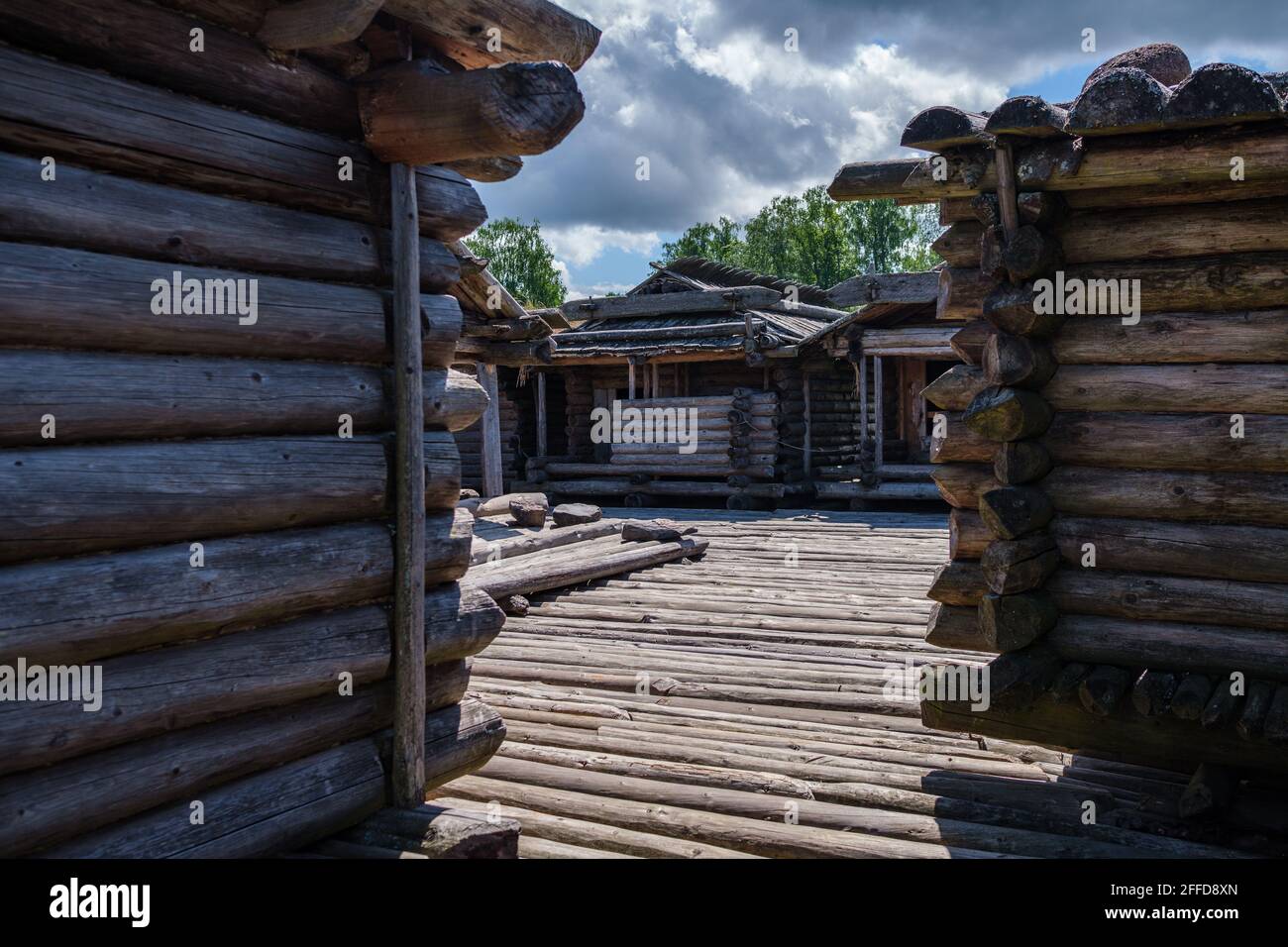 details of old restored wooden log castle. settlement of ancient people ...