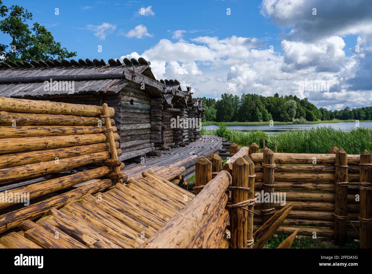 details of old restored wooden log castle. settlement of ancient people ...