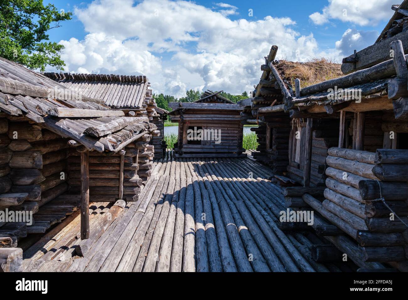 details of old restored wooden log castle. settlement of ancient people ...