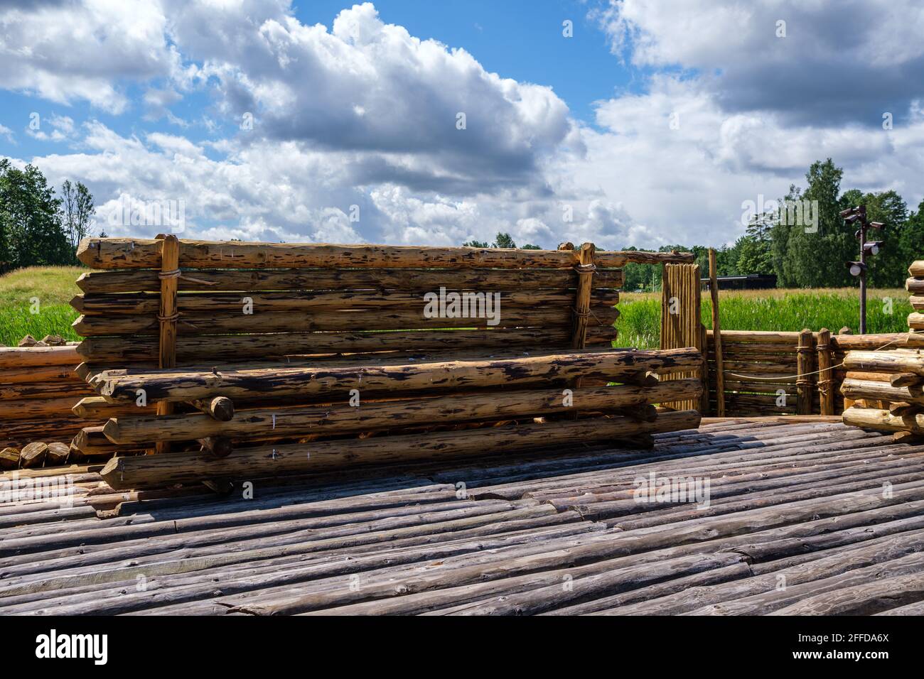 details of old restored wooden log castle. settlement of ancient people ...