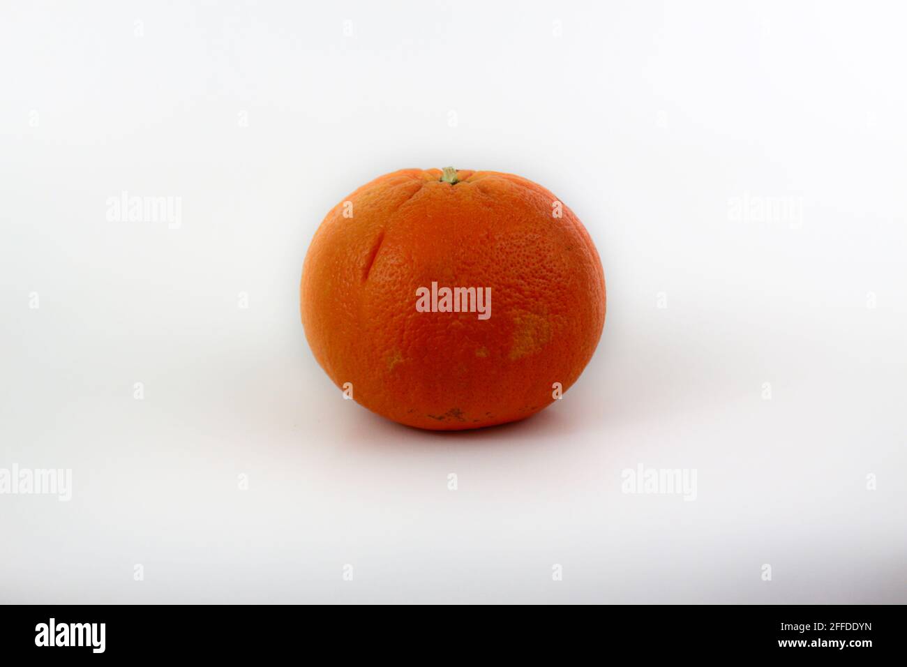 One orange isolated on white background Stock Photo - Alamy