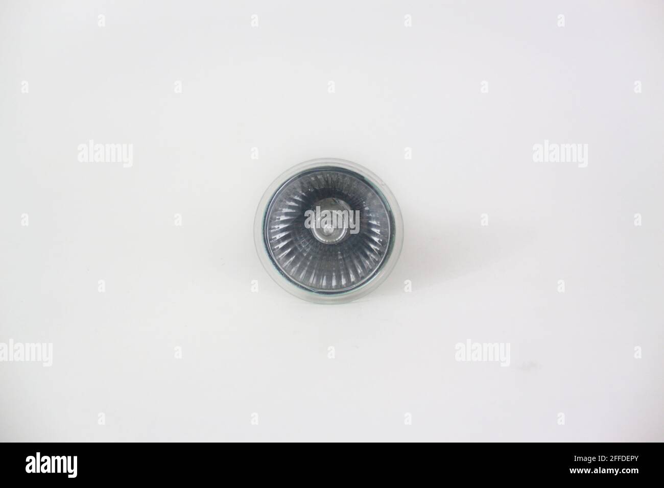 Light halogen spot isolated on white background Stock Photo - Alamy