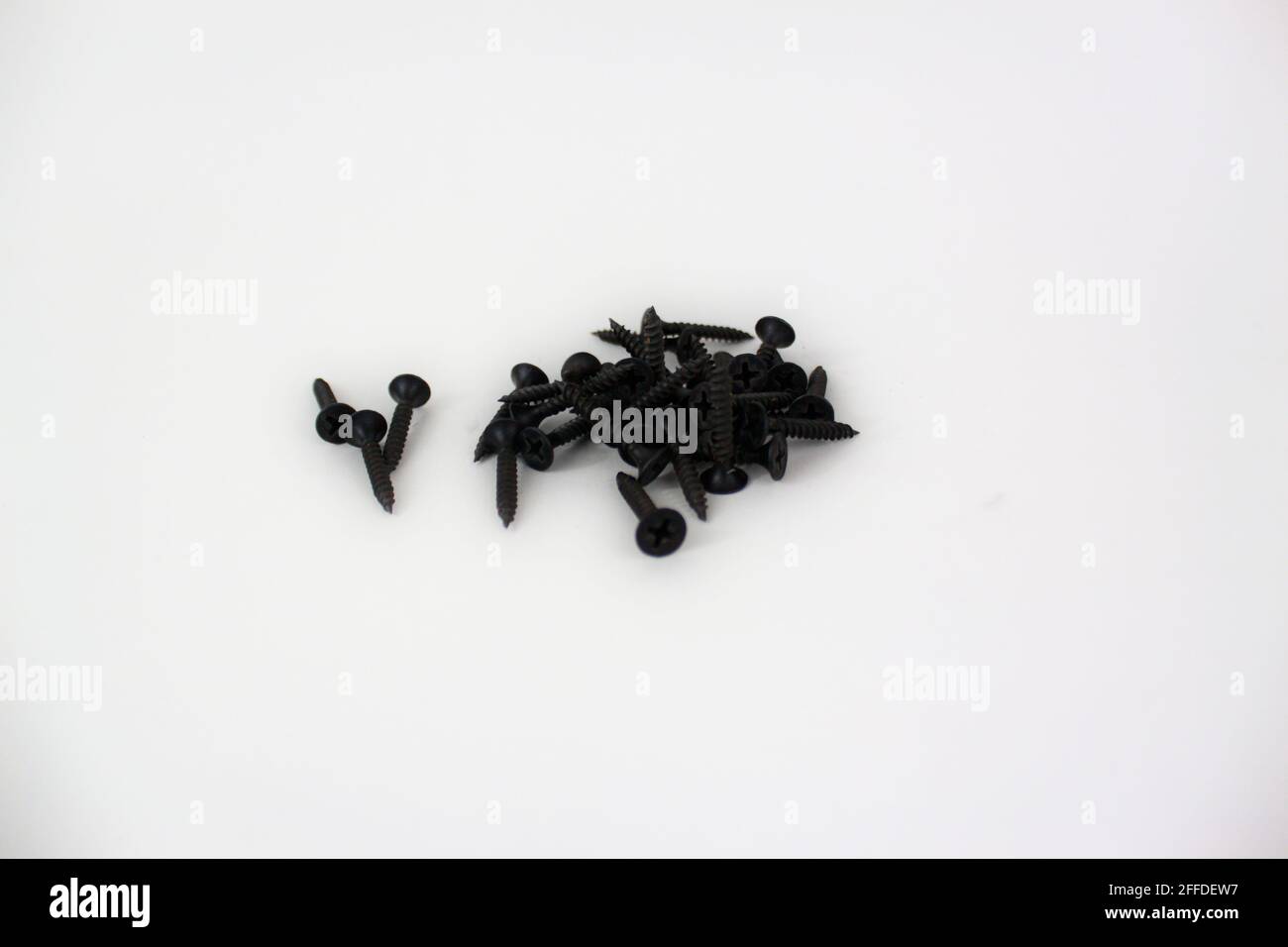 Self-driving black screws set isolated on white background Stock Photo ...