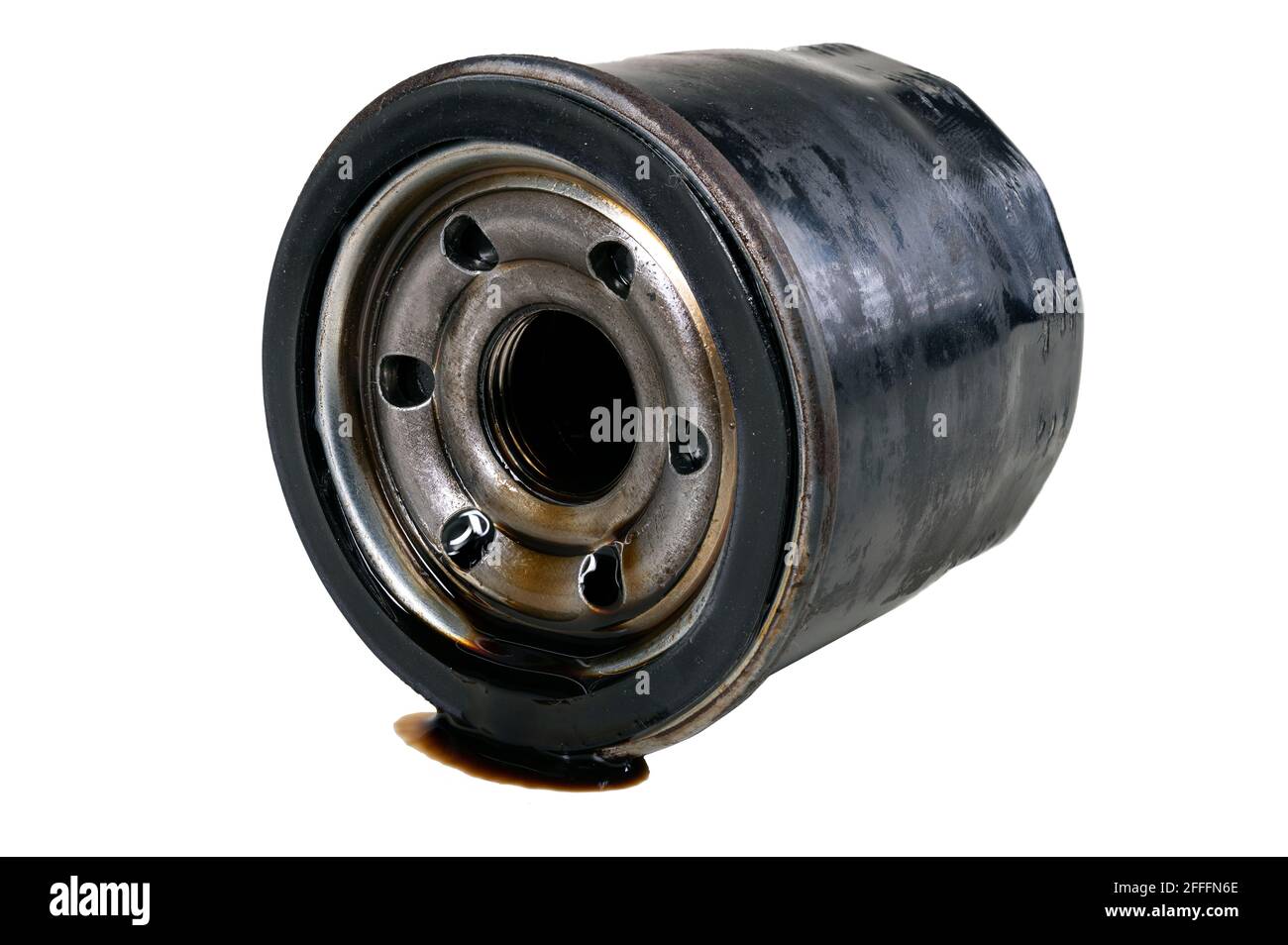 Heavily soiled oil filter from a passenger car. Spare parts for ...