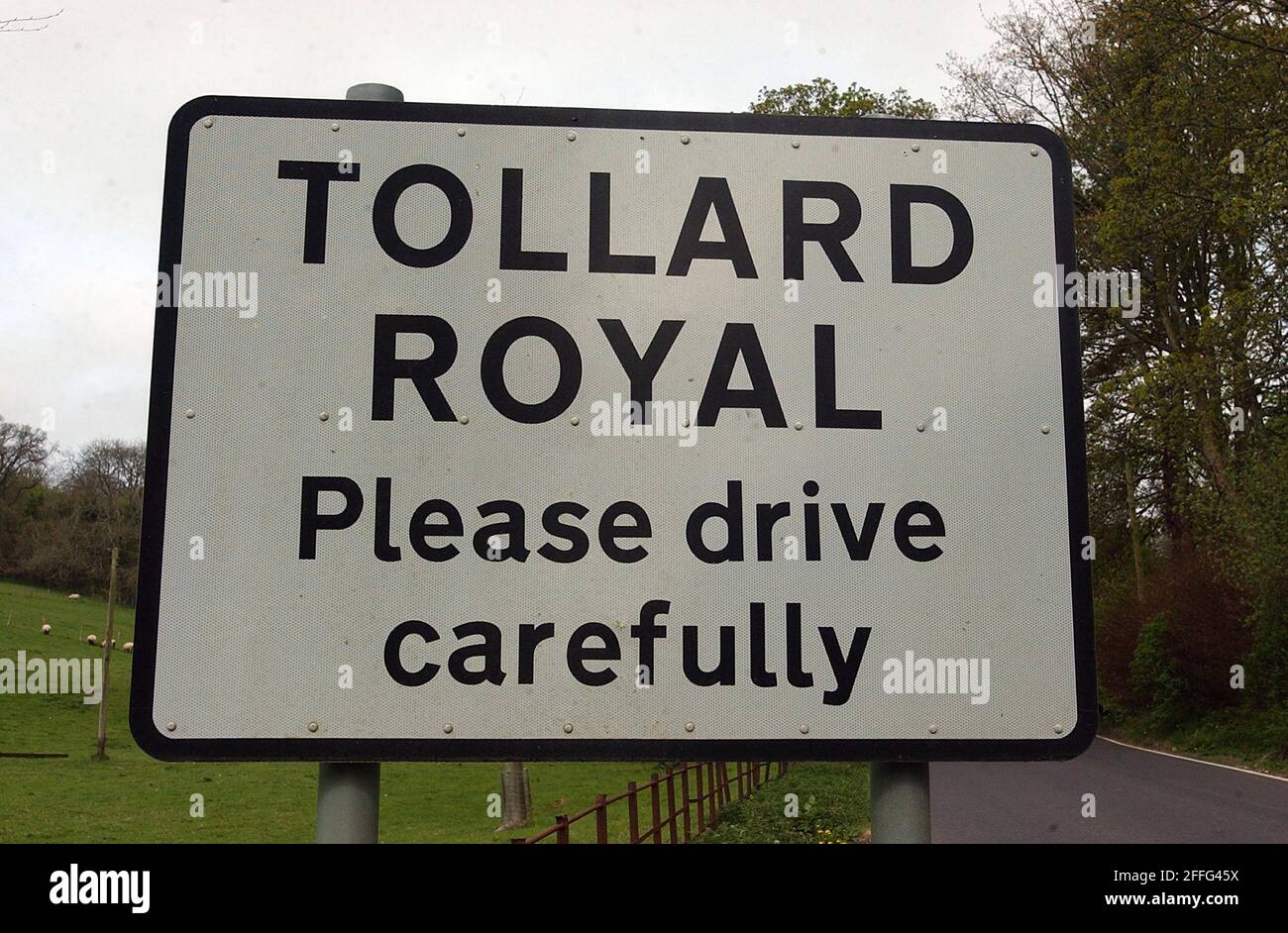 THE VILLAGE SIGN OF TOLLARD ROYAL, MADONNA'S VILLAGE HOME. PIC MIKE ...