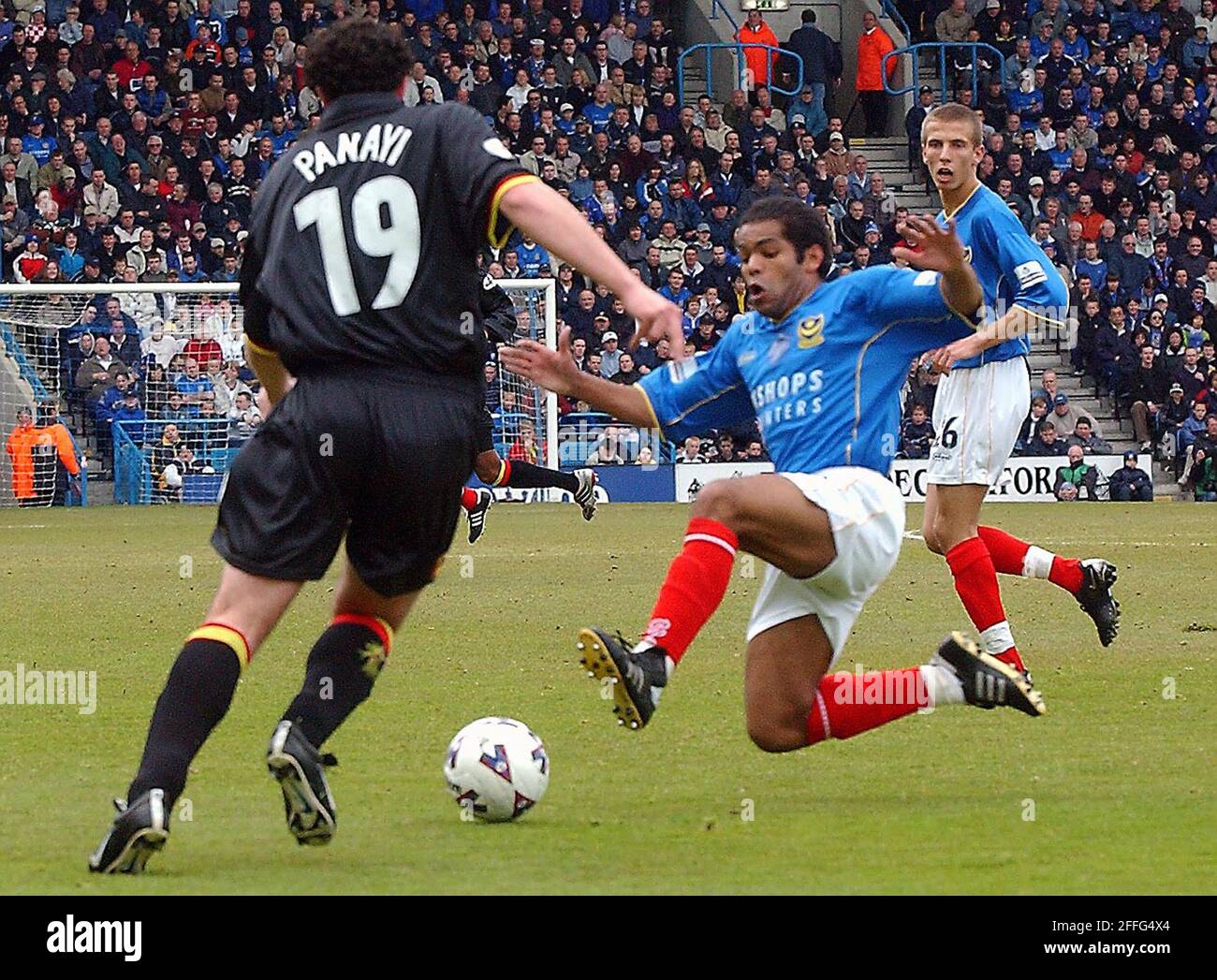 PORTSMOUTH V WATFORD PORTSMOUTH'S KEVIN HARPER LUNGES IN AT JAMES ...