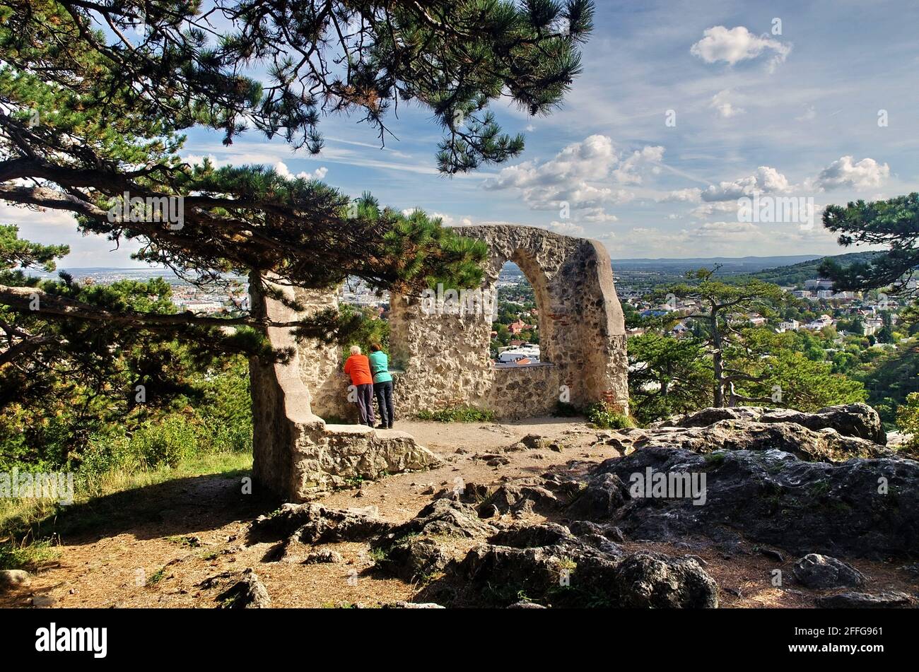 The couple rests on a tour of the castle ruins and looks out over the ...