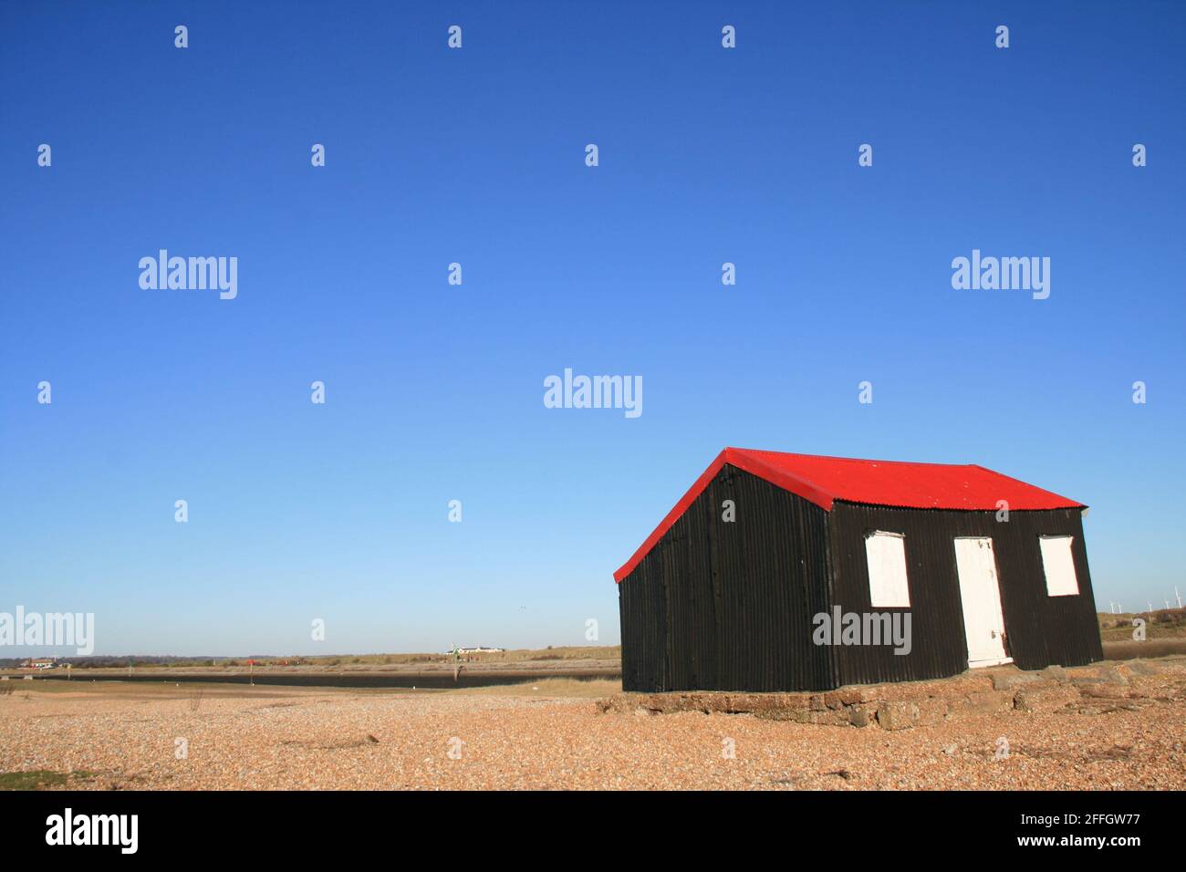 RED ROOFED HUT AT RYE HARBOUR WILDLIFE RESERVE IN SUSSEX Stock Photo ...