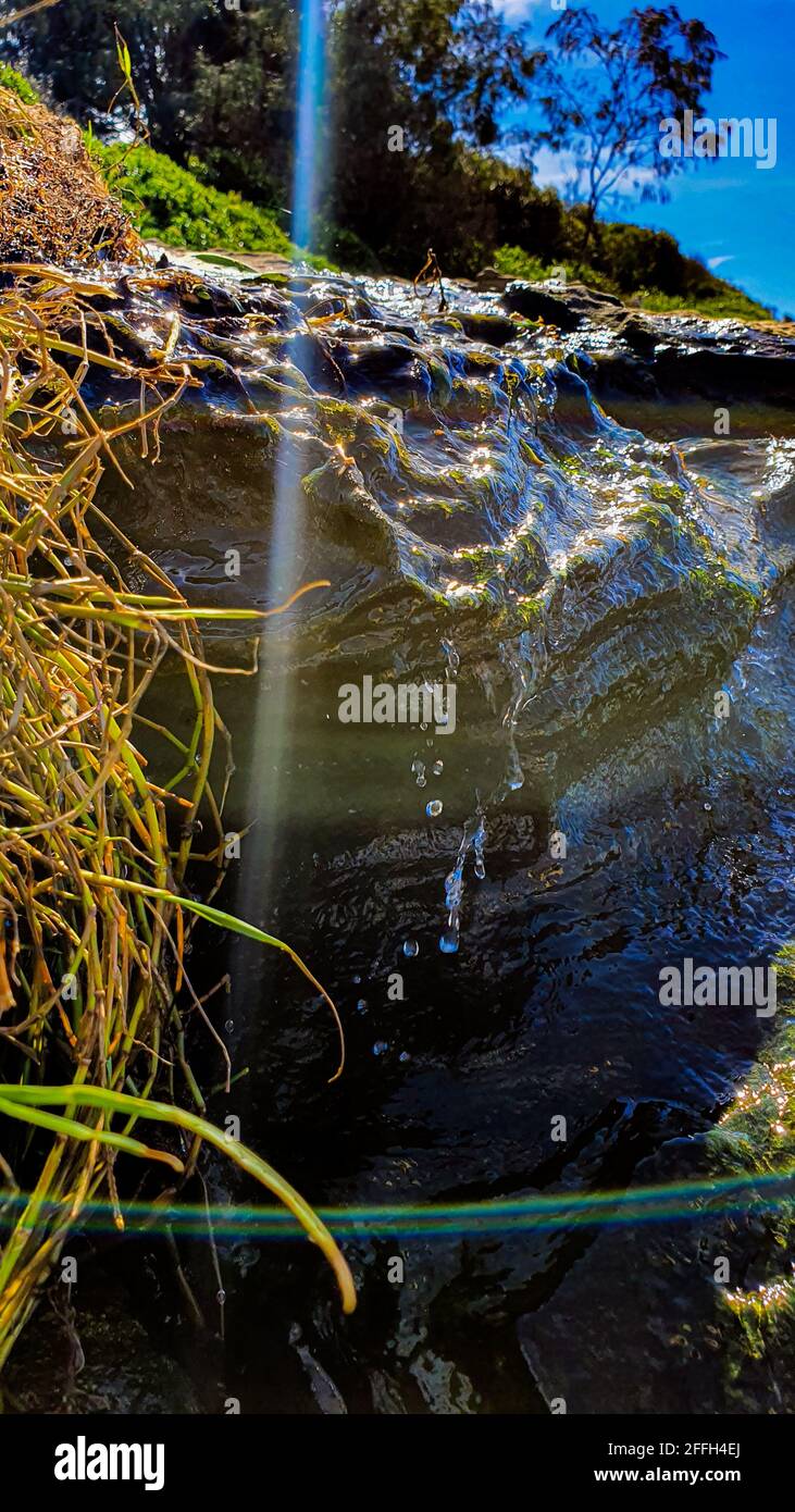 Water dripping from the stone Stock Photo - Alamy
