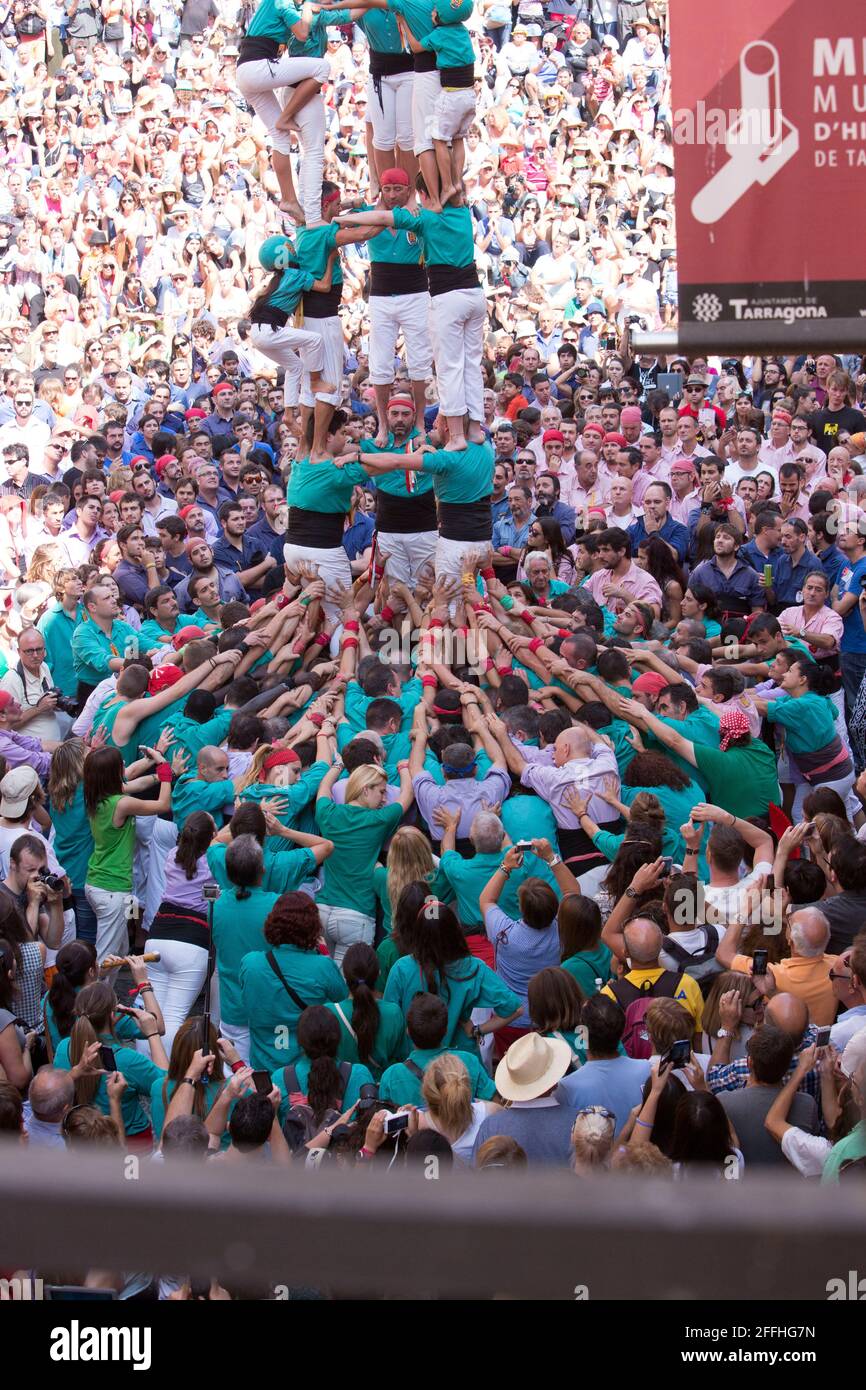 Traditional castellers building human castles hi-res stock photography ...
