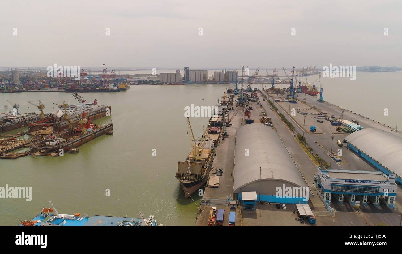 aerial view cargo and passenger seaport with ships and crane Tanjung ...