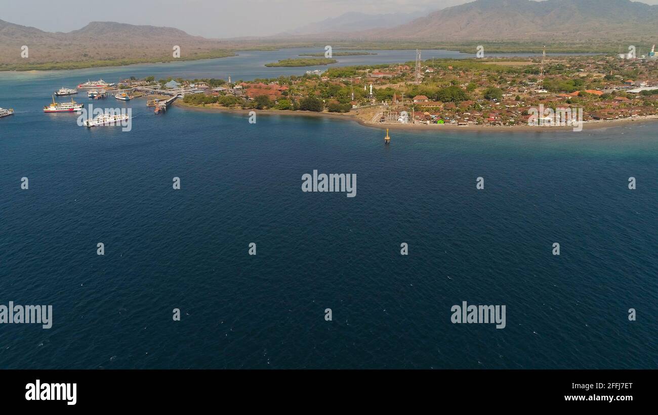 Aerial view ferry port gilimanuk with ferry boats, vehicles. Ferries ...