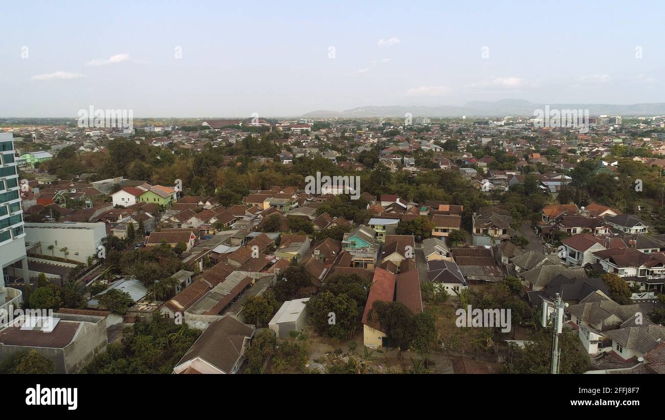 cityscape Yogyakarta with buildings, highway at sunset time. aerial ...