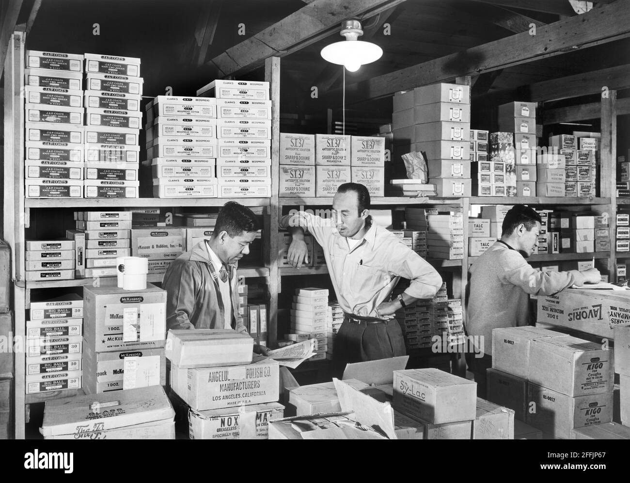 M. Ogi, S. Sugimoto, and Bunkichi Hayashi chekcing inventory in ...