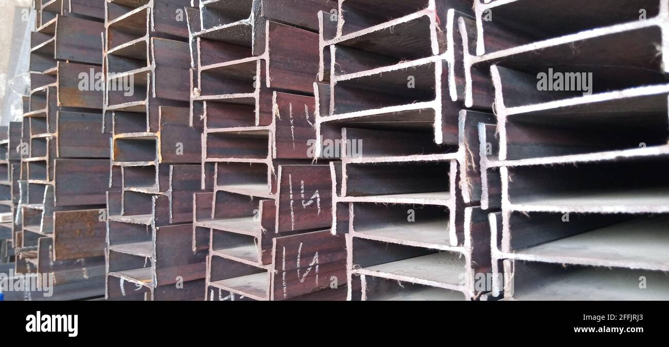 Closeup of a stack of steel beams Stock Photo - Alamy