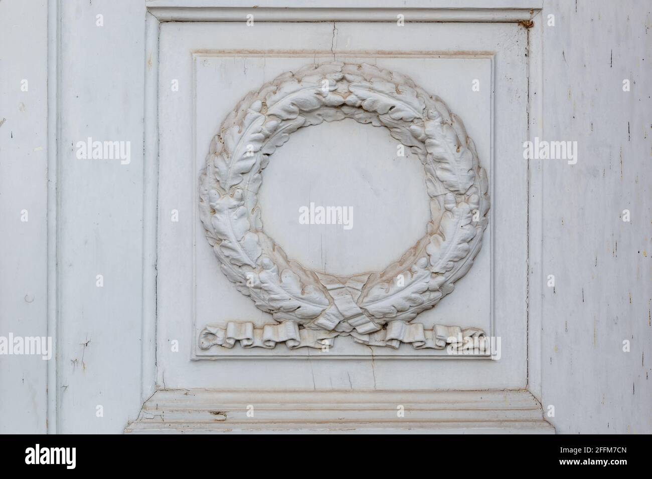 Detail of classical wreath of flower pattern low relief sculpture on ...