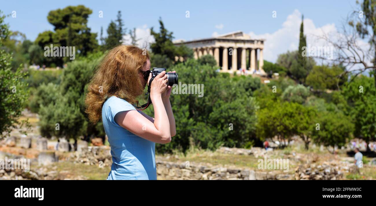 Girl tourist takes photo of Athens, Greece, Europe. Temple of ...