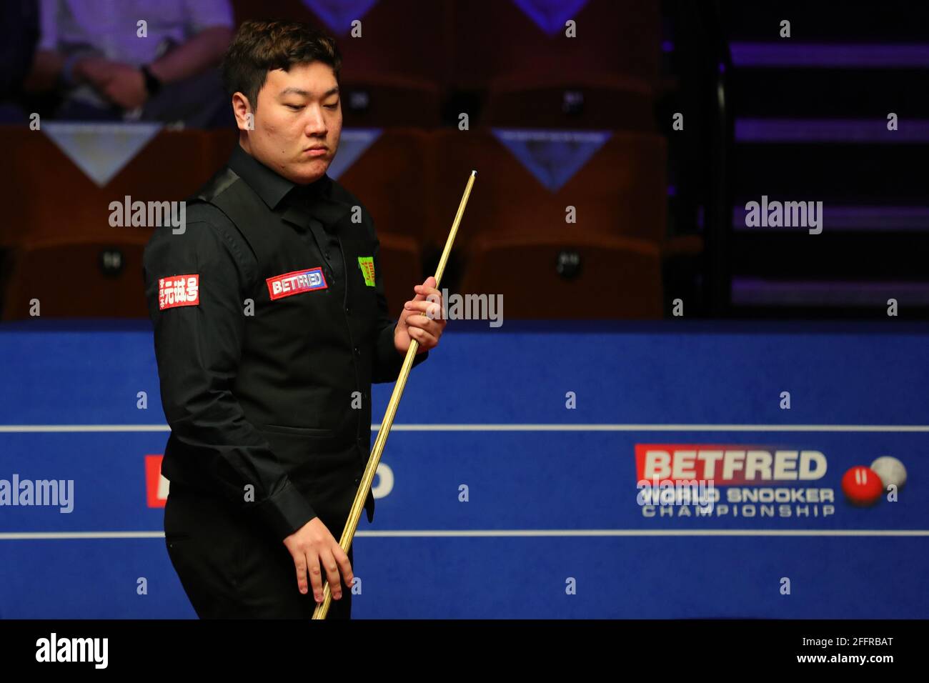 Sheffield, Britain. 24th Apr, 2021. China's Yan Bingtao competes during ...
