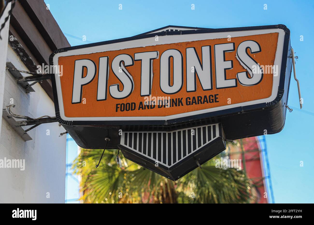 Illuminated sign of the Pistones restaurant in the center of Hermosillo ...