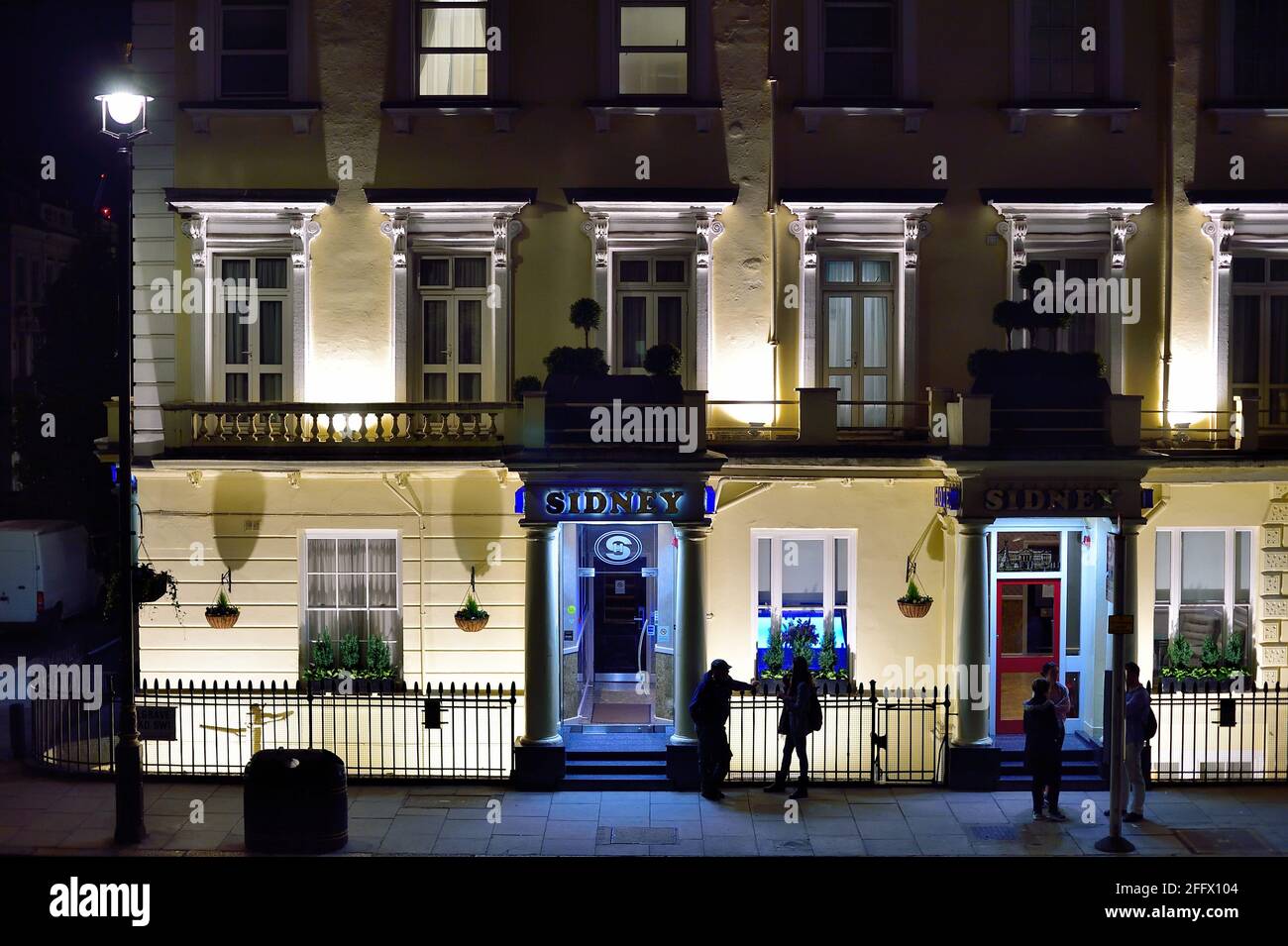 London, England, United Kingdom. Small tourist-oriented hotels line a ...