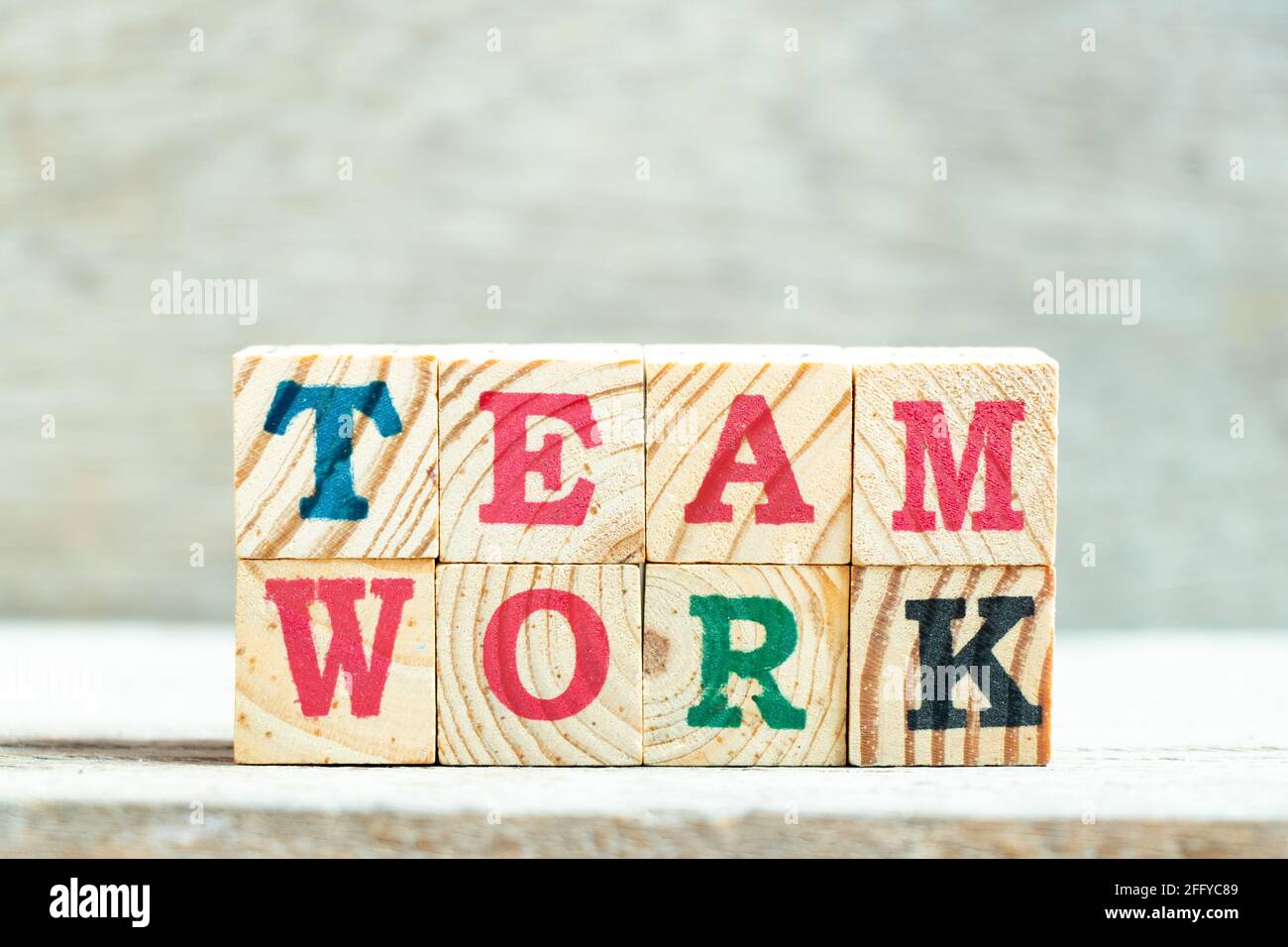 Alphabet letter block in word teamwork on wood background Stock Photo ...