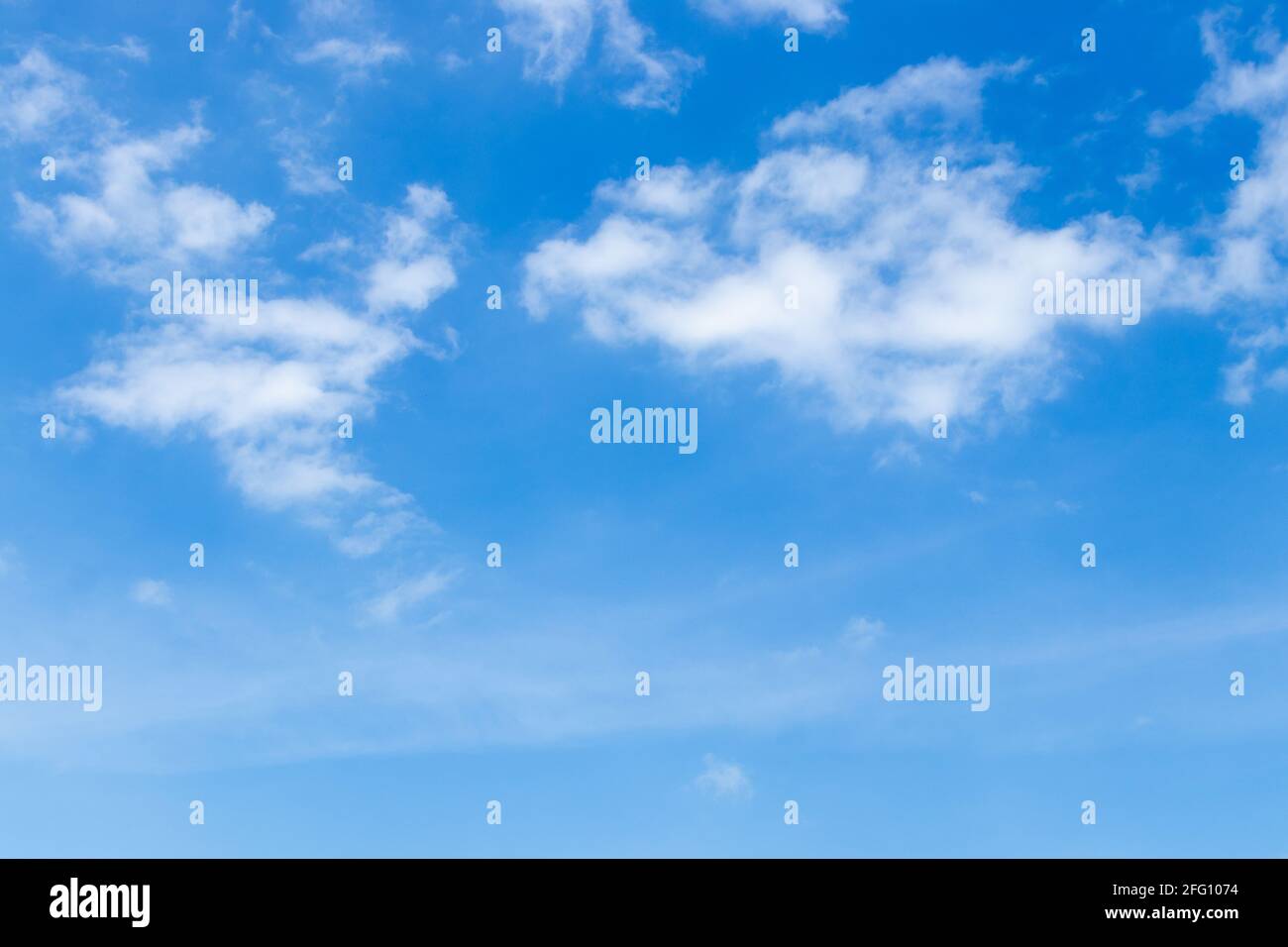 Clear blue color sky with white cloud background Stock Photo - Alamy