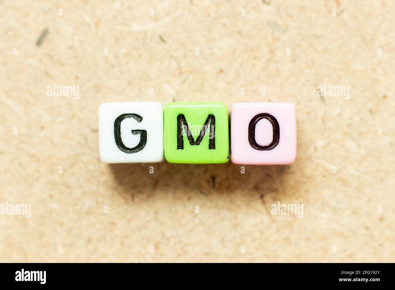 Color alphabet letter block in word GMO (abbreviation of Genetically ...