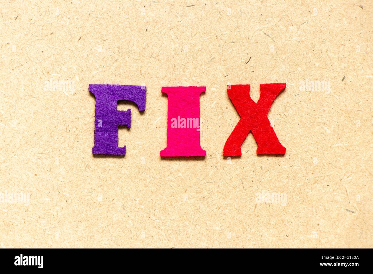 Color cloth alphabet letter in word fix on wood background Stock Photo ...