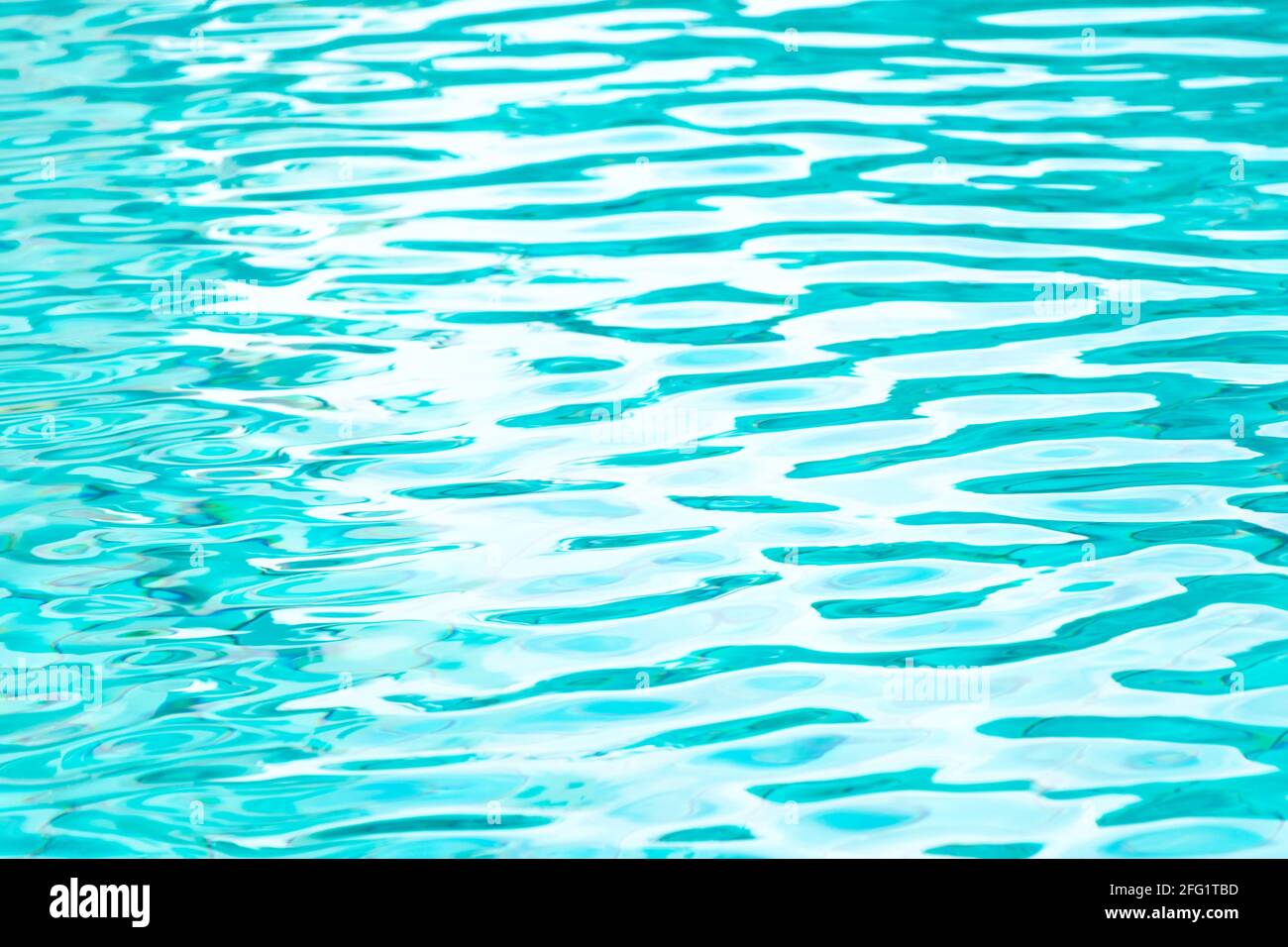 Ripple Water in swimming pool with blue tile floor background Stock ...