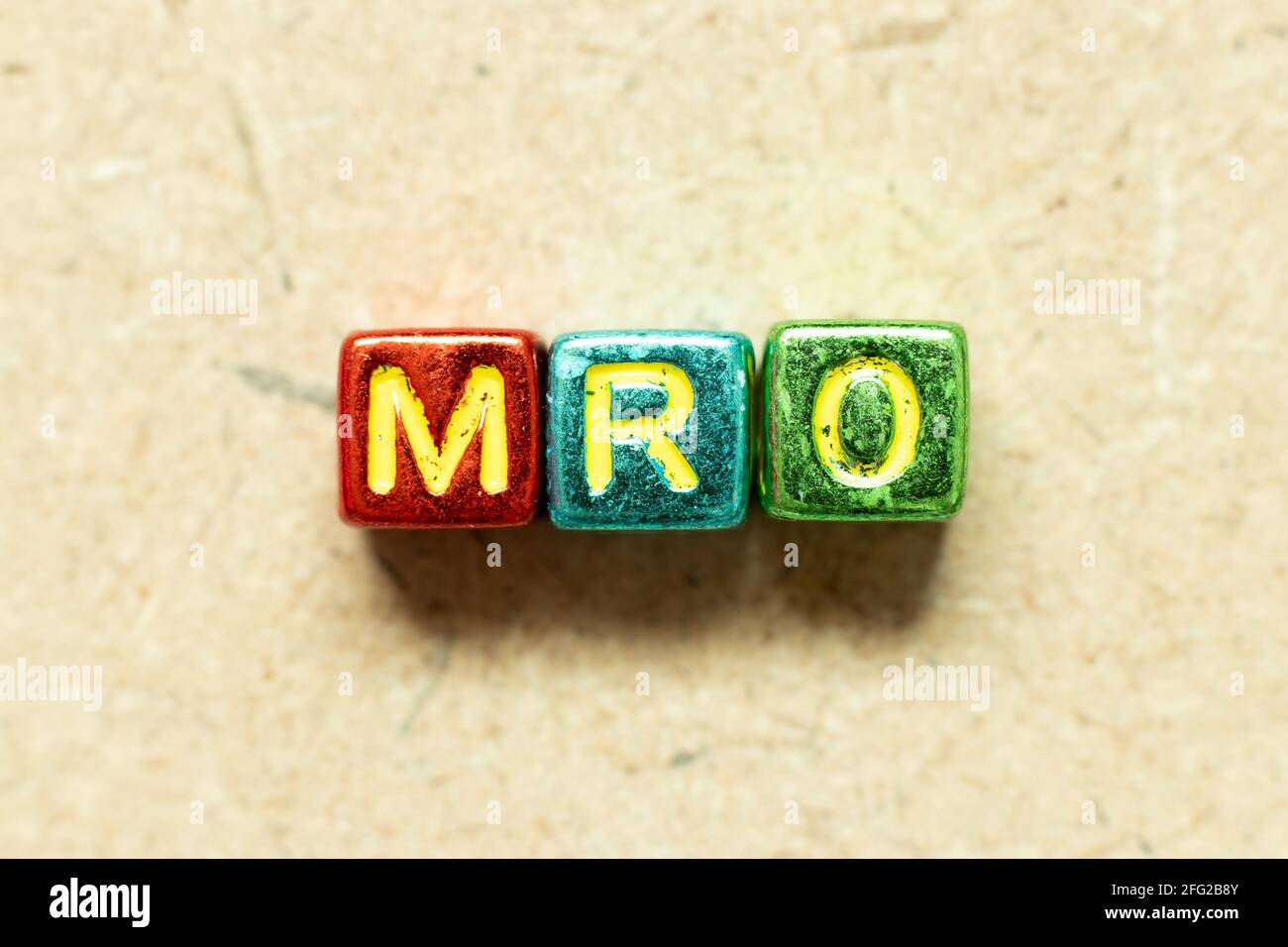 Metallic color alphabet letter block in word MRO (Abbreviation of ...