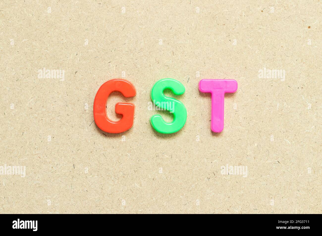 Color alphabet letter with word GST (Abbreviation of Goods and Service ...