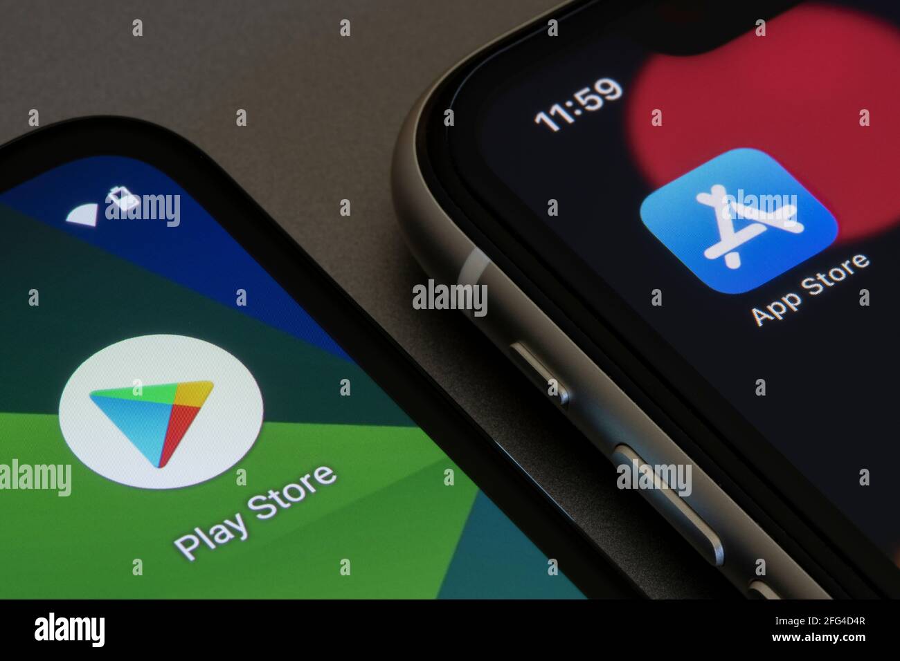 Google Play Store and Apple App Store icons are seen respectively on a ...