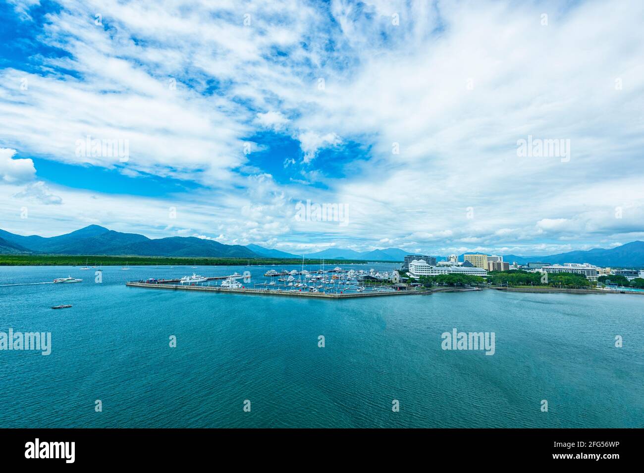 Aerial View of the city of Cairns, the Marina and Trinity Inlet, Far ...