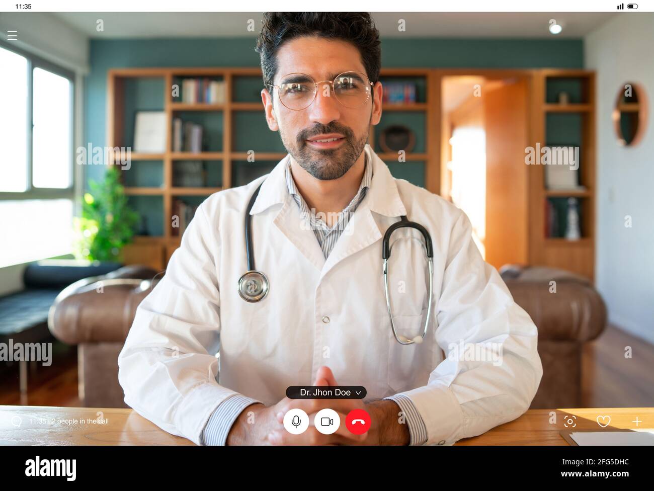 Doctor talking patient using video hi-res stock photography and images ...