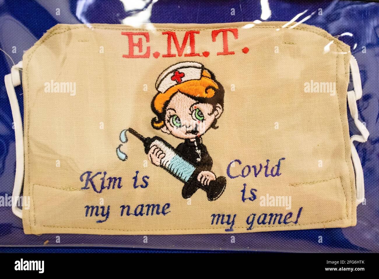 Reno, United States. 24th Apr, 2021. A custom face mask of a vaccine ...