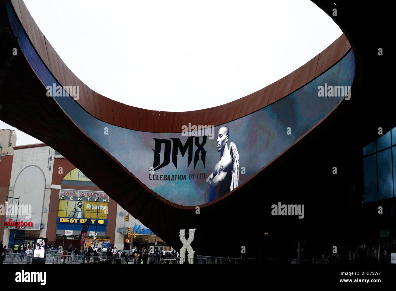 New York, USA. 24th Apr, 2021. Marquis displays DMX logos as people ...