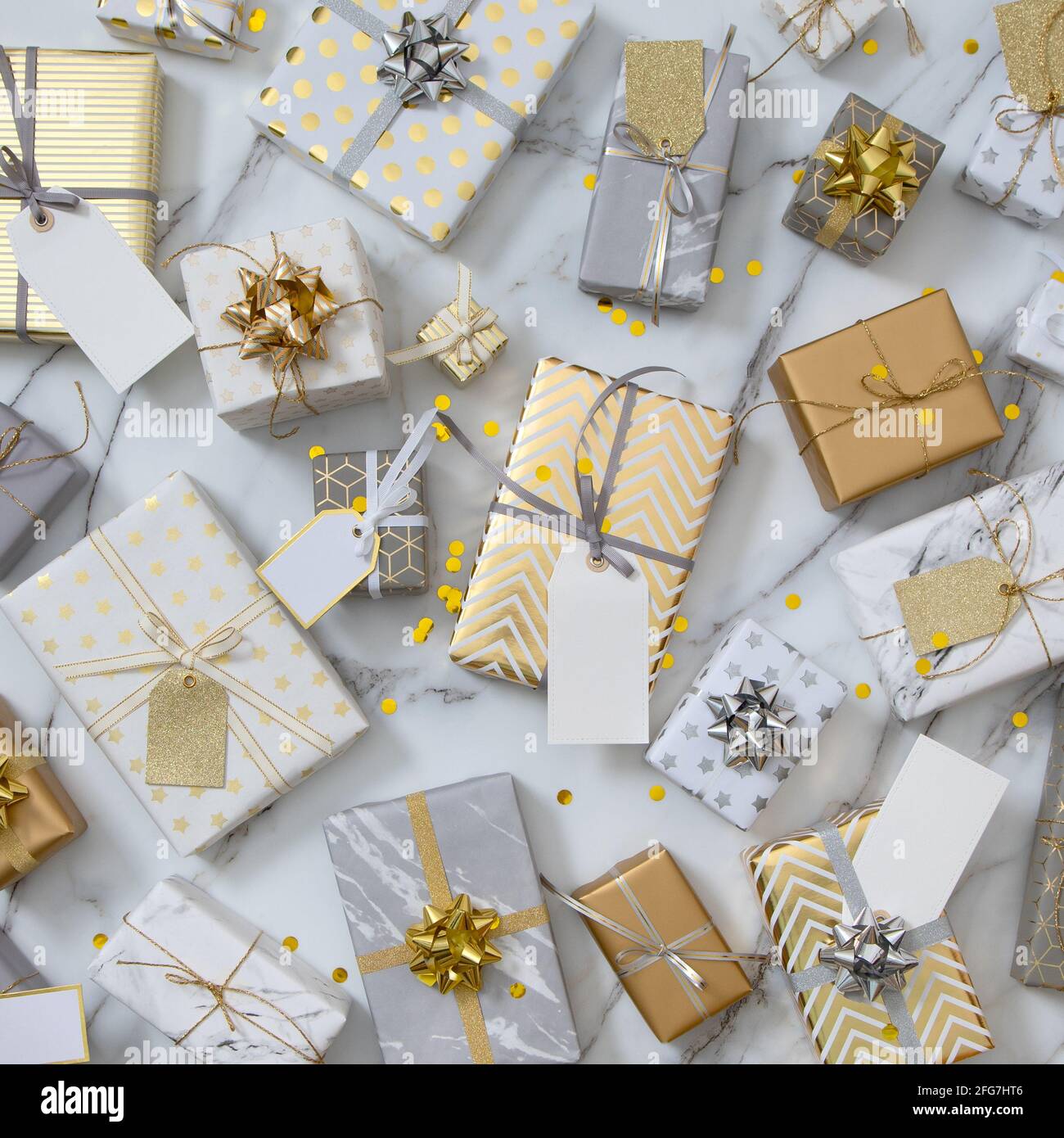 Many gift boxes with labels numbers wrapped in glossy classical pack ...